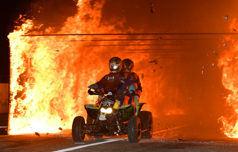 Longest quadbike ride through a tunnel of fire | Guinness World Records