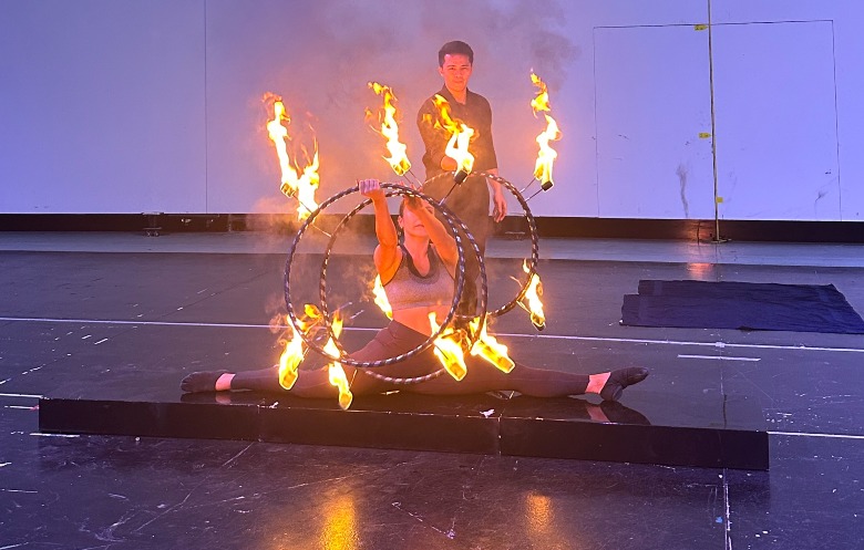 Most fire hoops spun while in splits position | _guinness_world_records ...