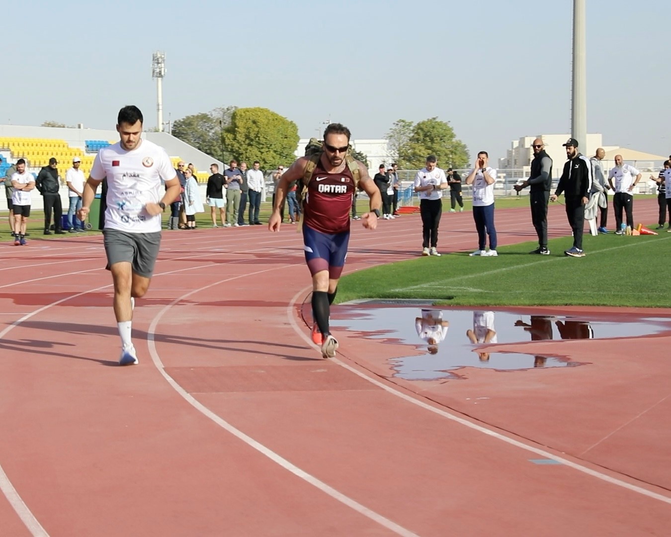 Fastest one mile carrying 80 lb pack (male) | Guinness World Records