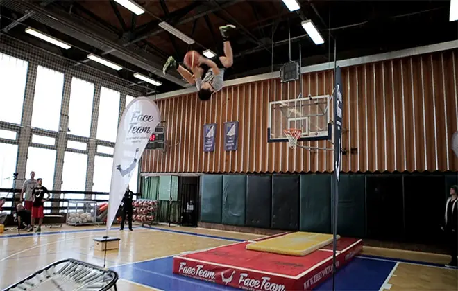 Farthest somersault trampette slam dunk | Guinness World Records