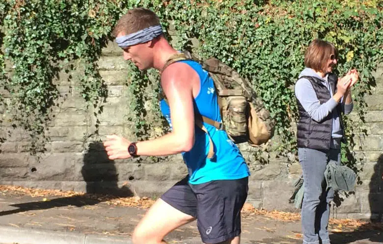 Fastest half marathon carrying a 20 lb pack (male) | Guinness World Records