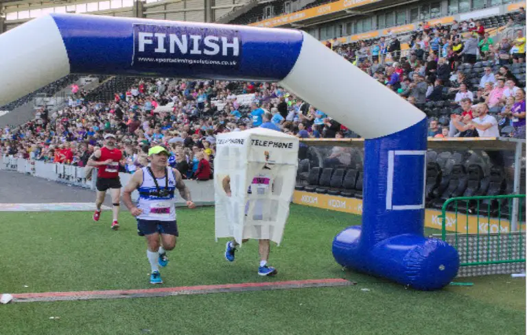 Fastest marathon dressed as a telephone box (male) | Guinness World Records