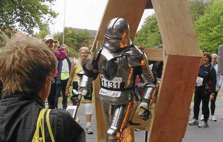 Fastest marathon wearing armour | _guinness_world_records_label