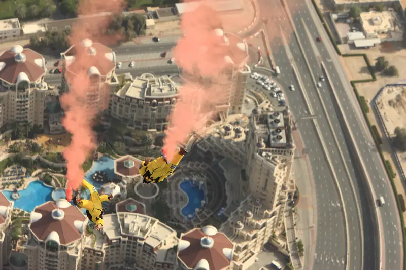 Highest BASE jump from a building | _guinness_world_records_label