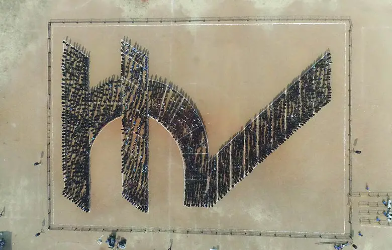 Largest human currency symbol | Guinness World Records